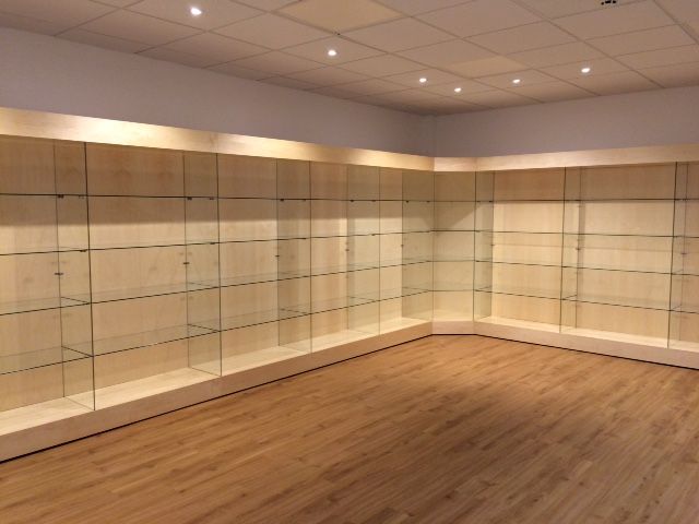 Showcasing Achievements: How Glass Cabinets Elevate Your Reception ...